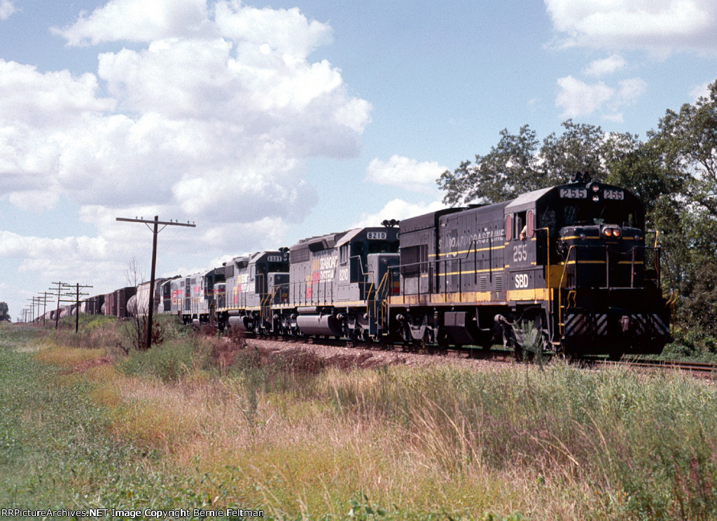 Seaboard System U18B #255, SD40-2 #8210, GP38-2 #6009 and GP16's #4625 & #4642 lead an eastbound ...